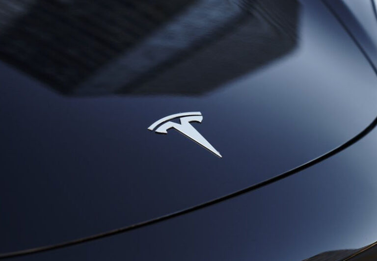 J.P. Morgan Cuts Tesla Price Target Amid Declining Deliveries, Customer ...