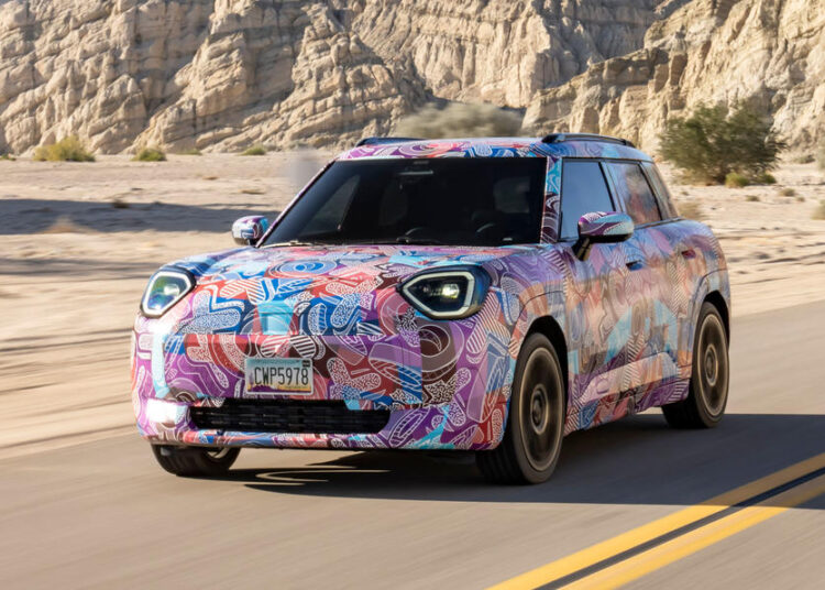 Mini unveiled its first all-electric Mini Cooper SE as a convertible ...